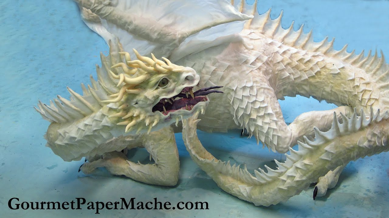 Watch as this incredible paper mache dragon comes to life
