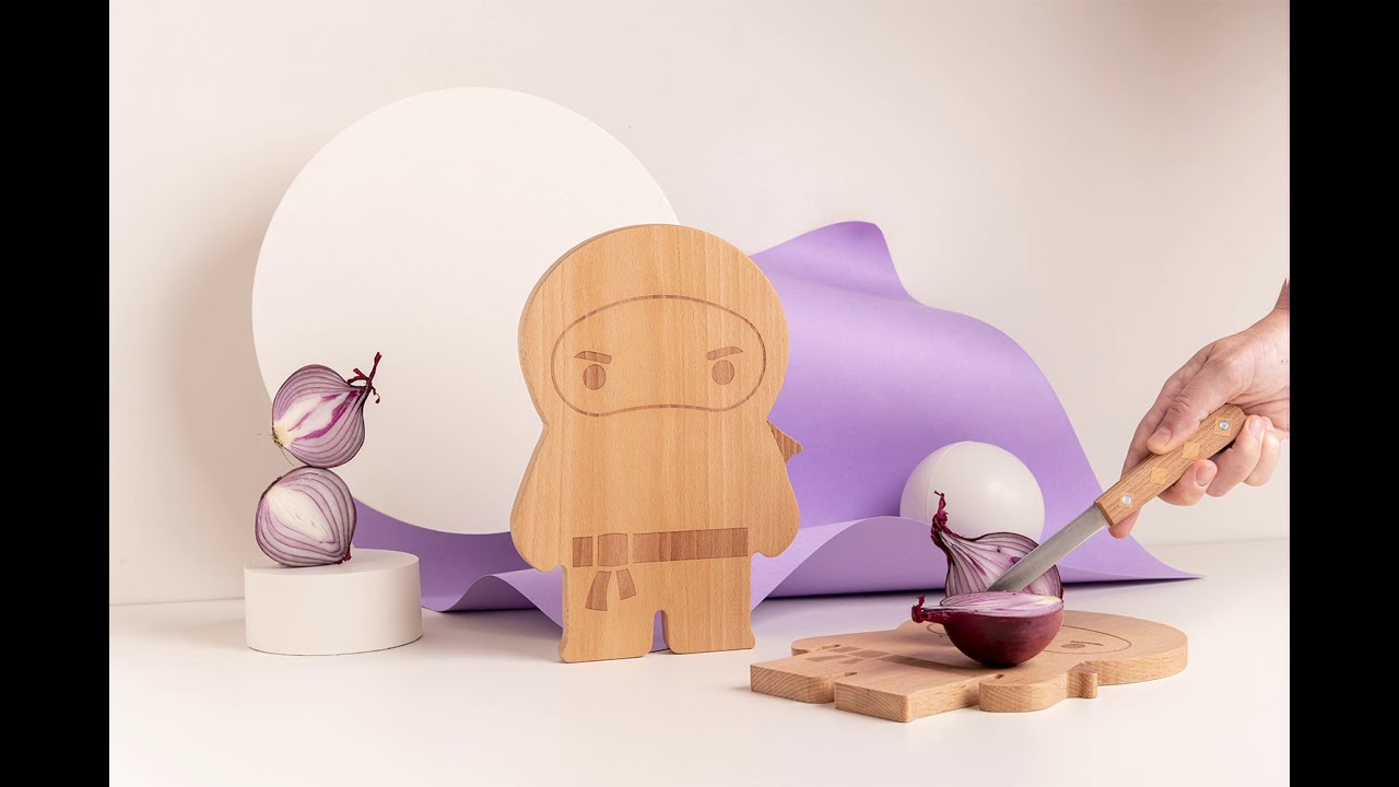 A ninja cutting board wearing a knife like a sword